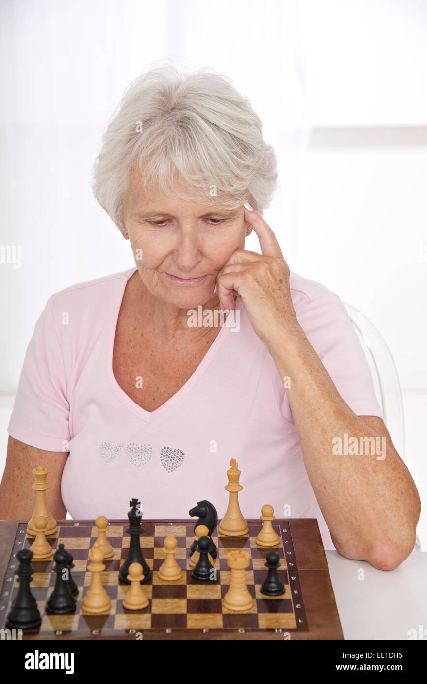 ELDERLY PEOPLE PLAYING CHESS Stock Photo - Alamy