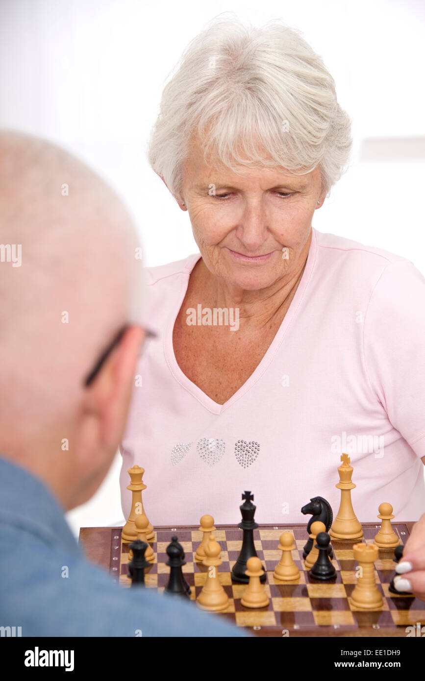 Elderly man playing chess hi-res stock photography and images - Alamy