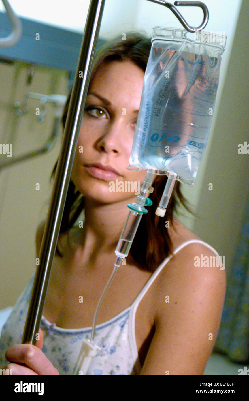 WOMAN WITH A DRIP Stock Photo - Alamy