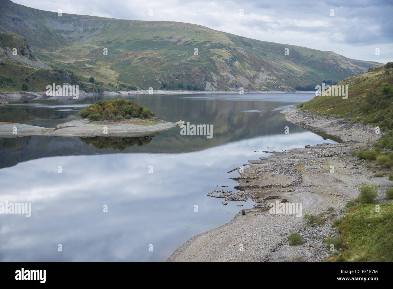 View of upland reservoir with low water level and remains of submerged ...