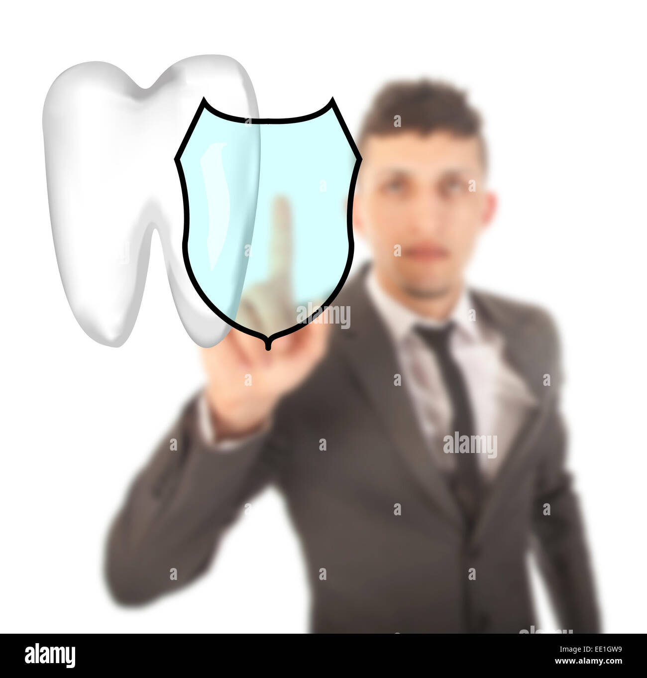 Young man with tooth shield symbol isolated on white background Stock ...