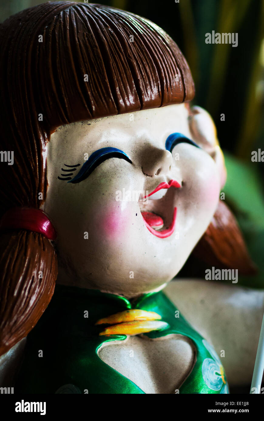 Antique doll smile still life Stock Photo - Alamy