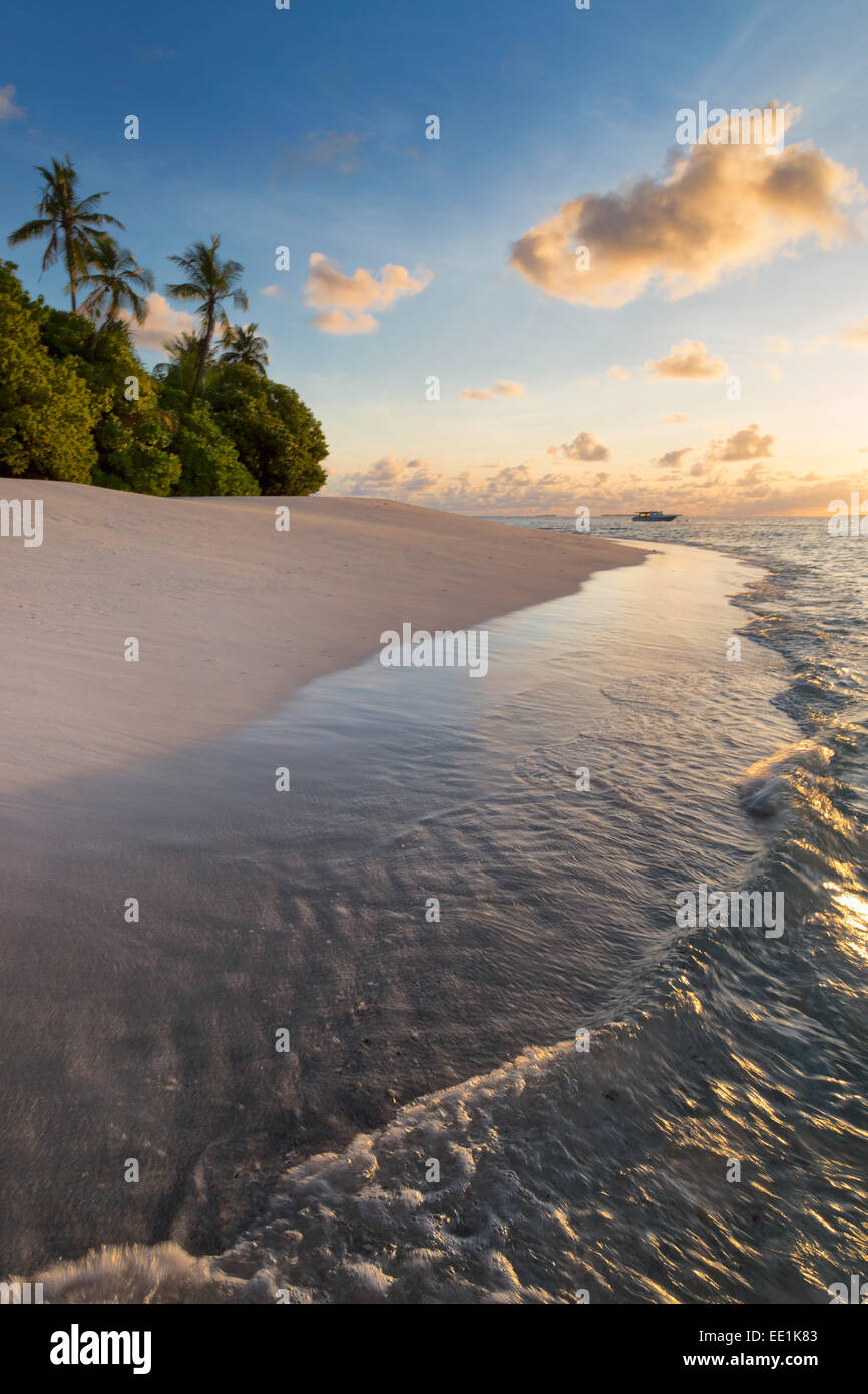 Morning light on a deserted beach on an island in the Northern Huvadhoo ...