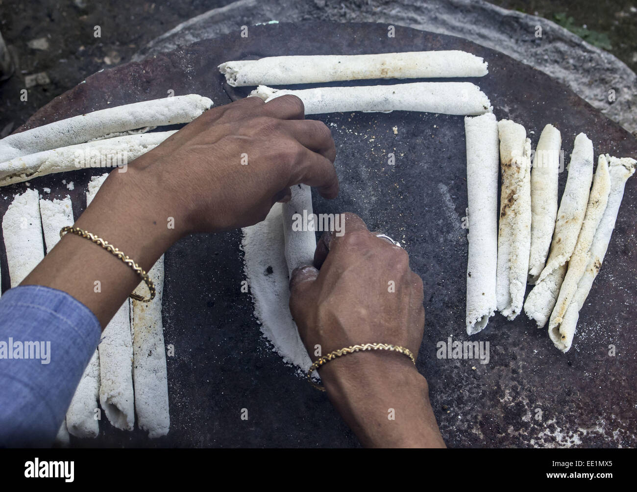 Assamese cake hi-res stock photography and images - Alamy