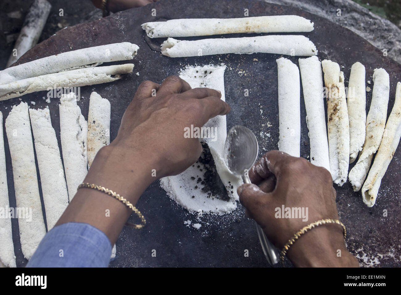 Assamese cake hi-res stock photography and images - Alamy