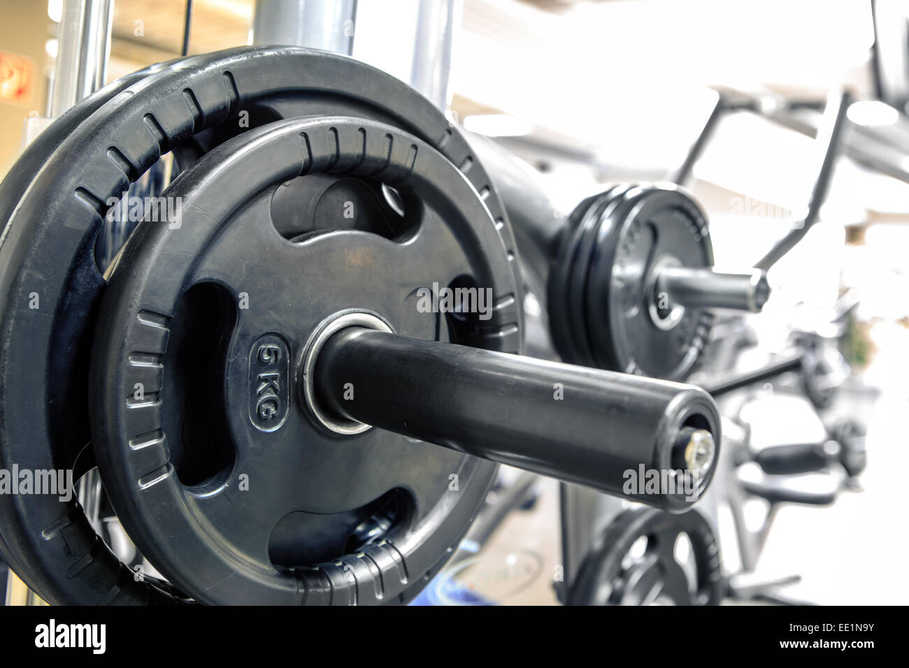 diverse equipment and machines at the gym room Stock Photo - Alamy