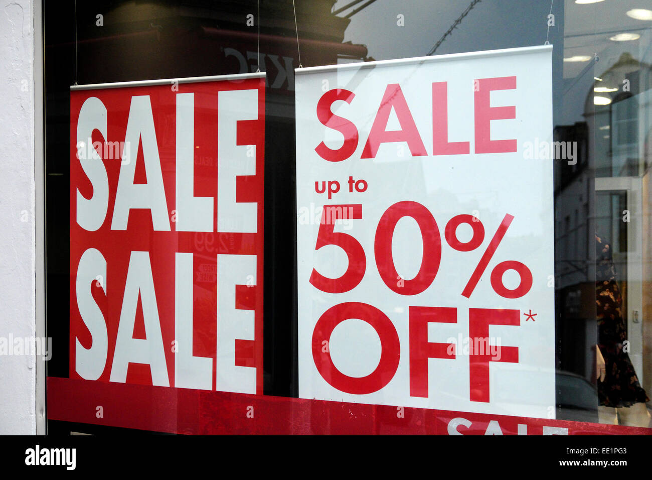 A sale sign in a shop window Stock Photo - Alamy