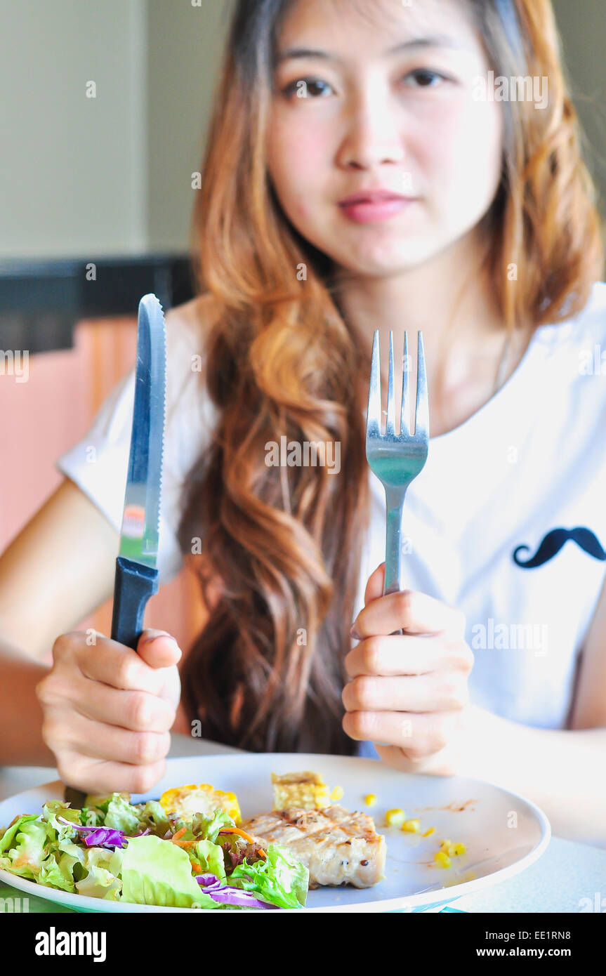 Holding a knife and fork hi-res stock photography and images - Alamy
