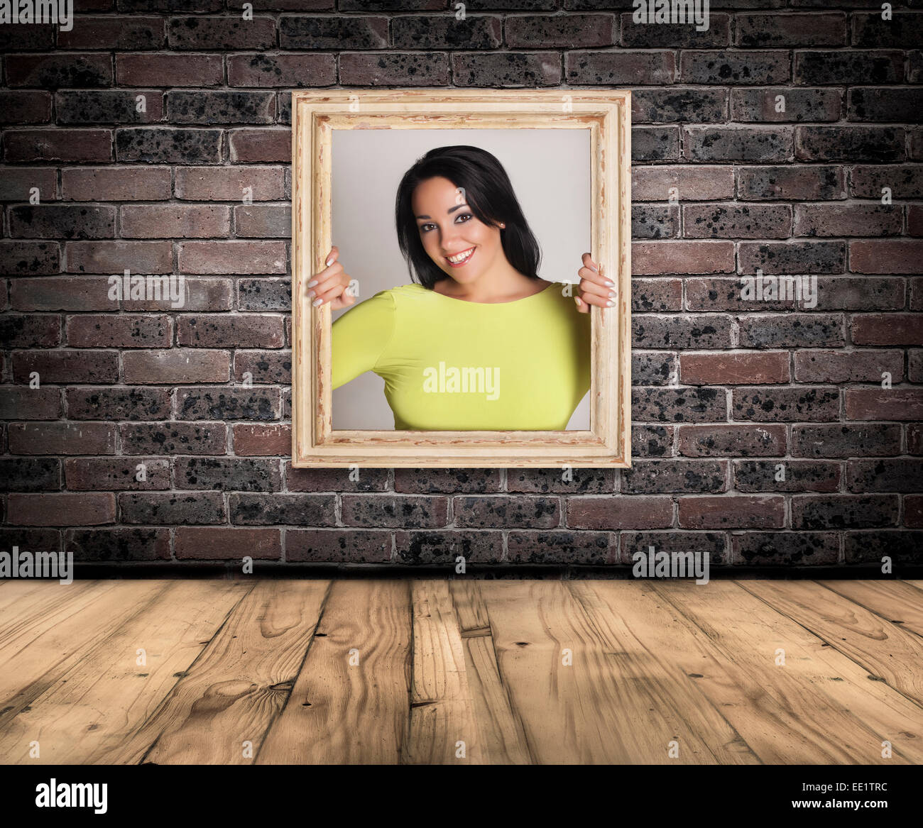 Abstract image of a beautiful woman trapped in a picture frame over a ...