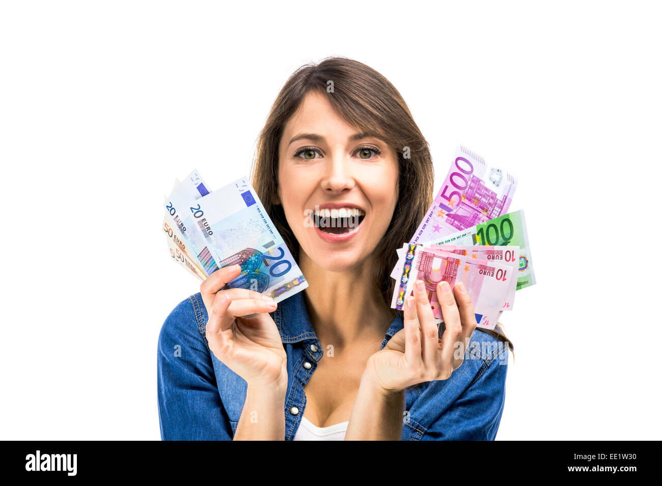 Beauitful woman holding some Euro currency notes, isolated over white ...