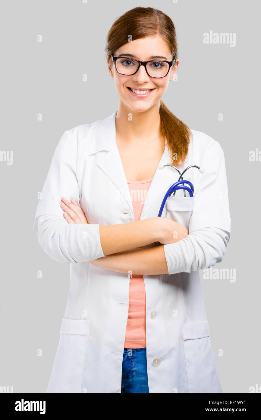 Beautiful and attractive female doctor, isolated over a white ...