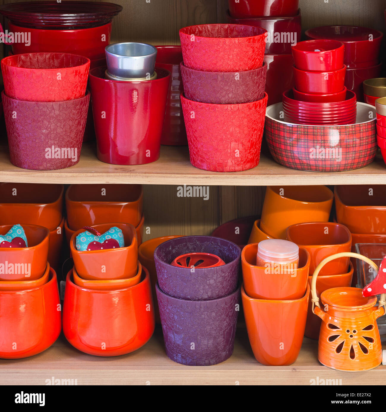 new ceramic flowerpots in the florist store Stock Photo - Alamy