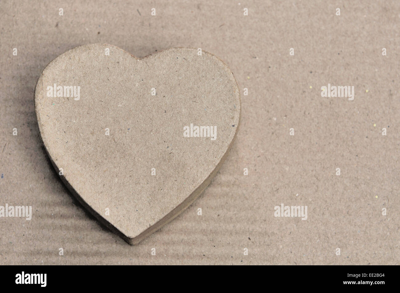 heart shaped box recycled cardboard on cardboard background Stock Photo ...
