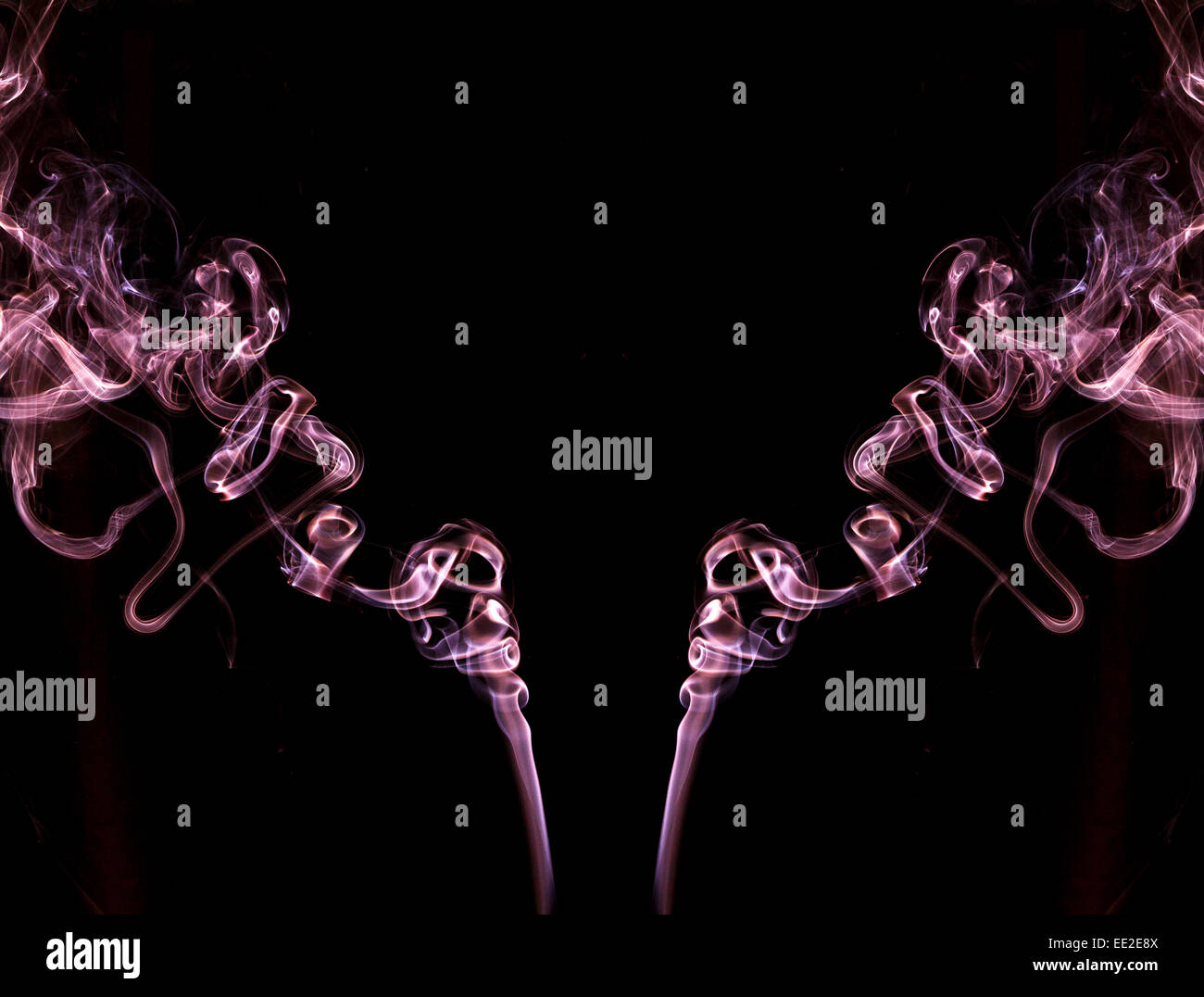 Abstract symmetrical smoke pattern flipped for symmetry. Pink smoke on ...