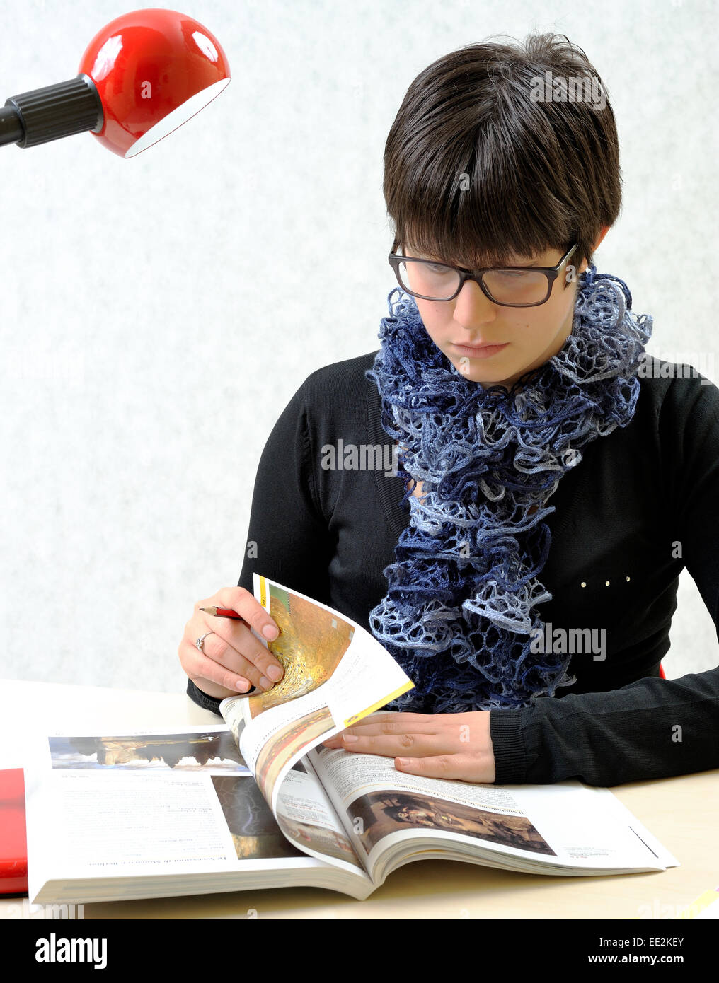 Student engaged in reading Stock Photo - Alamy