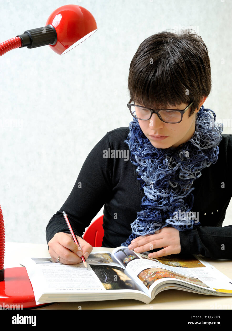 Student engaged in reading Stock Photo - Alamy