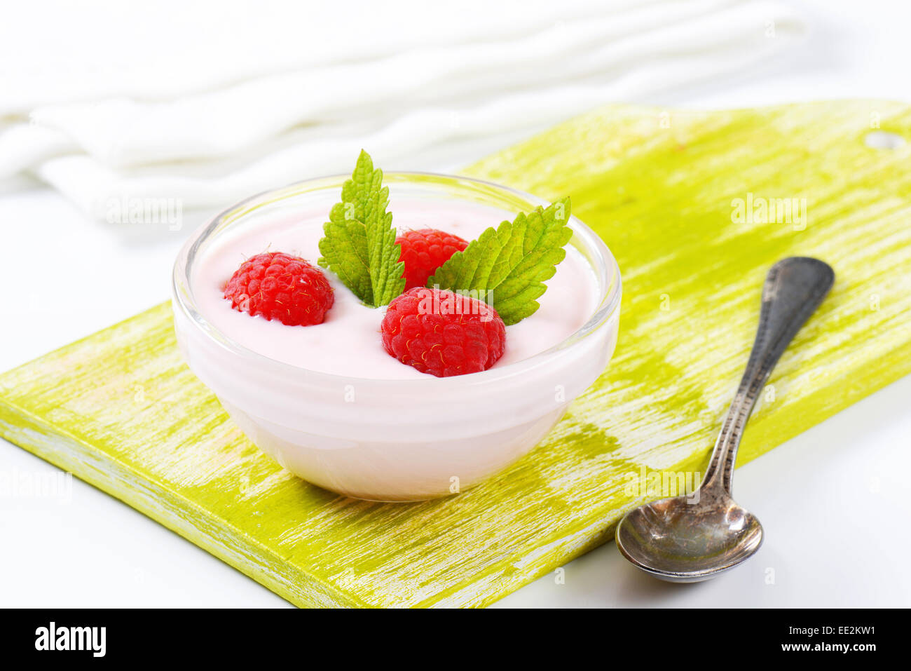 Light raspberry yogurt with fresh raspberries Stock Photo - Alamy