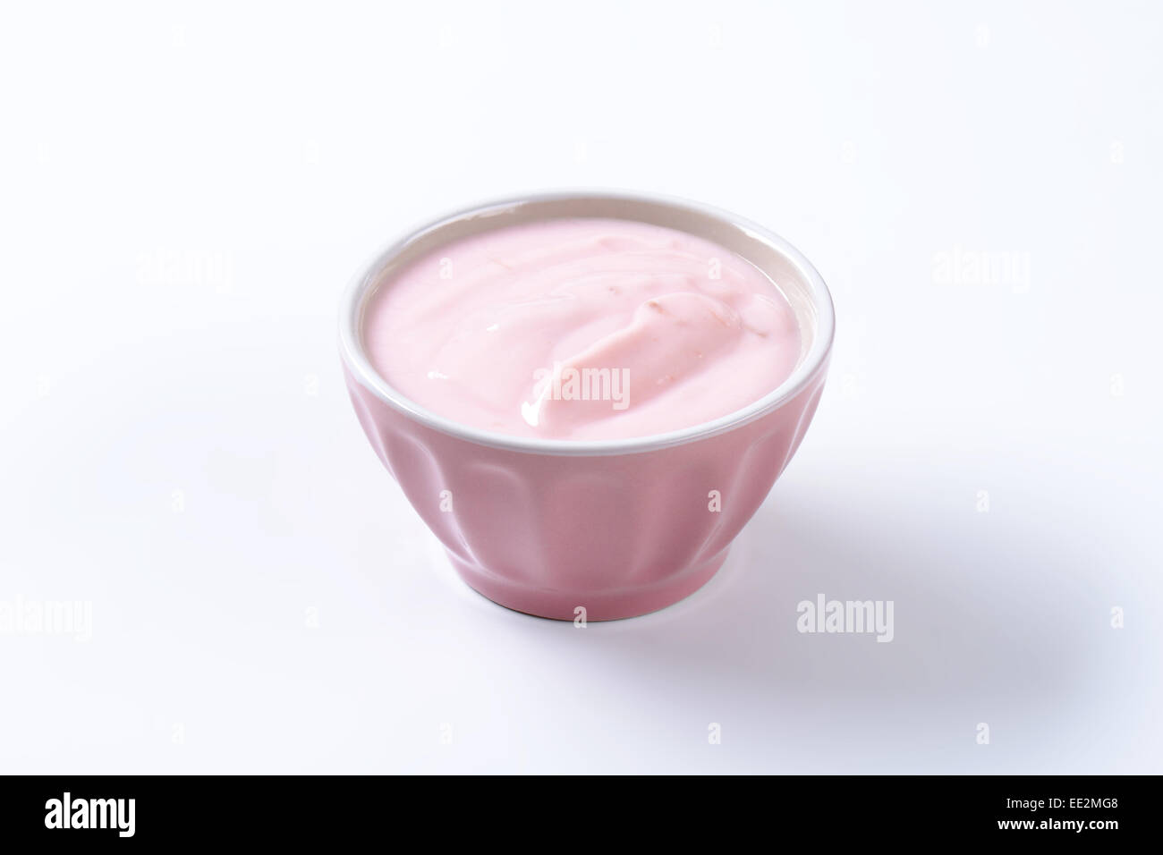 Light raspberry yogurt in pink porcelain bowl Stock Photo - Alamy