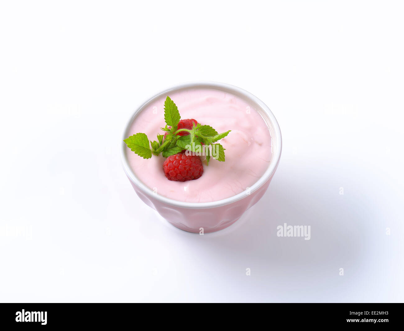 Light raspberry yogurt in pink porcelain bowl Stock Photo - Alamy