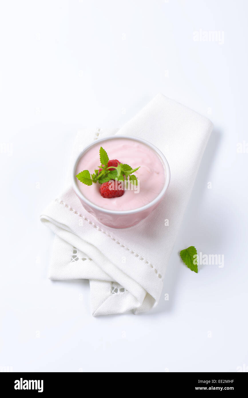 Light raspberry yogurt in pink porcelain bowl Stock Photo - Alamy