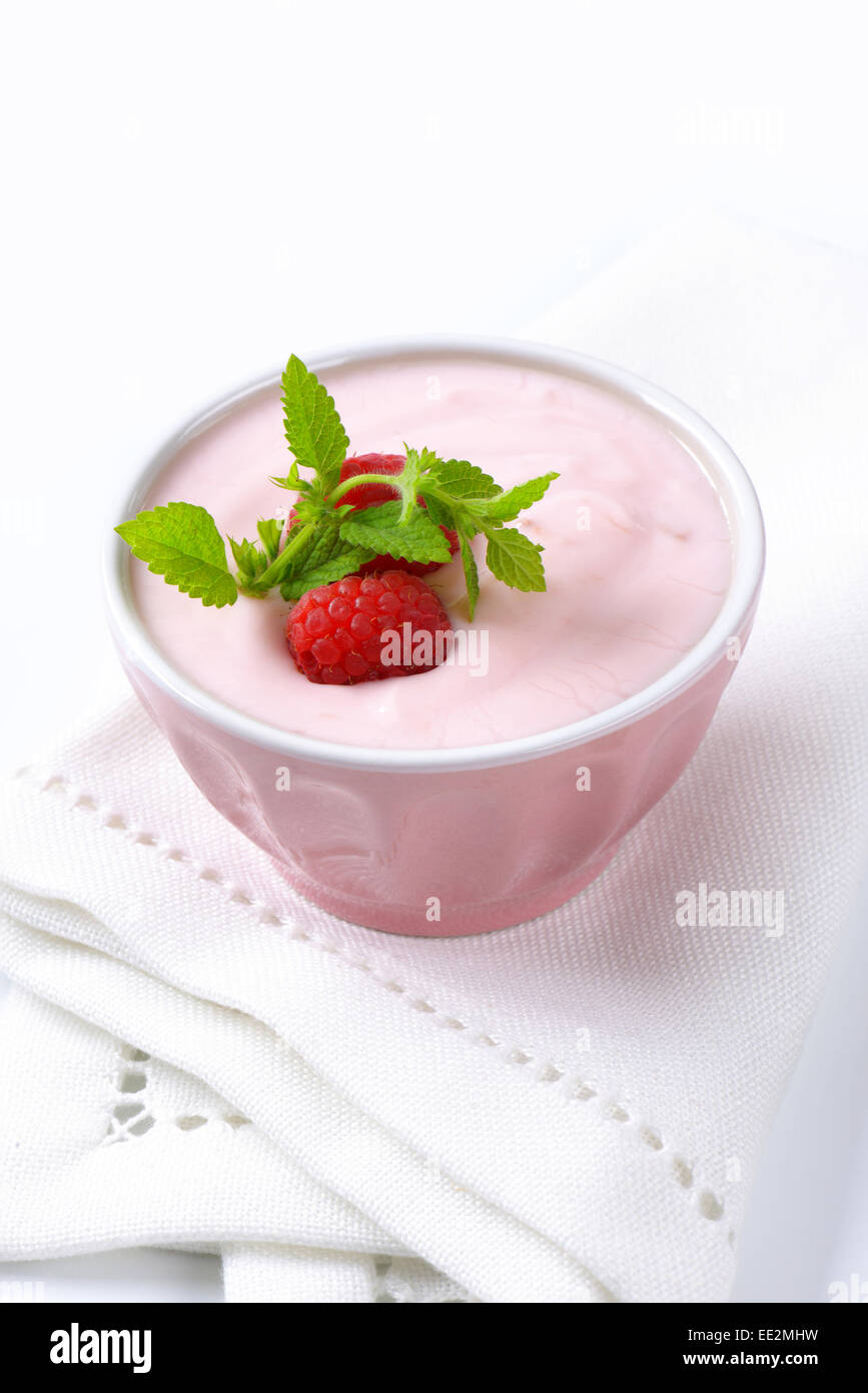 Light raspberry yogurt in pink porcelain bowl Stock Photo - Alamy
