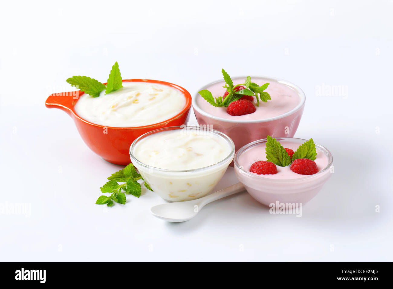 Bowls of yogurt with fruit Stock Photo - Alamy