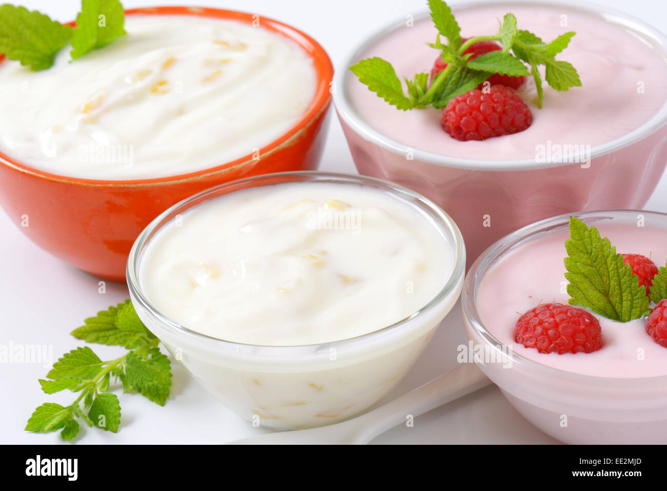 Bowls of yogurt with fruit Stock Photo - Alamy