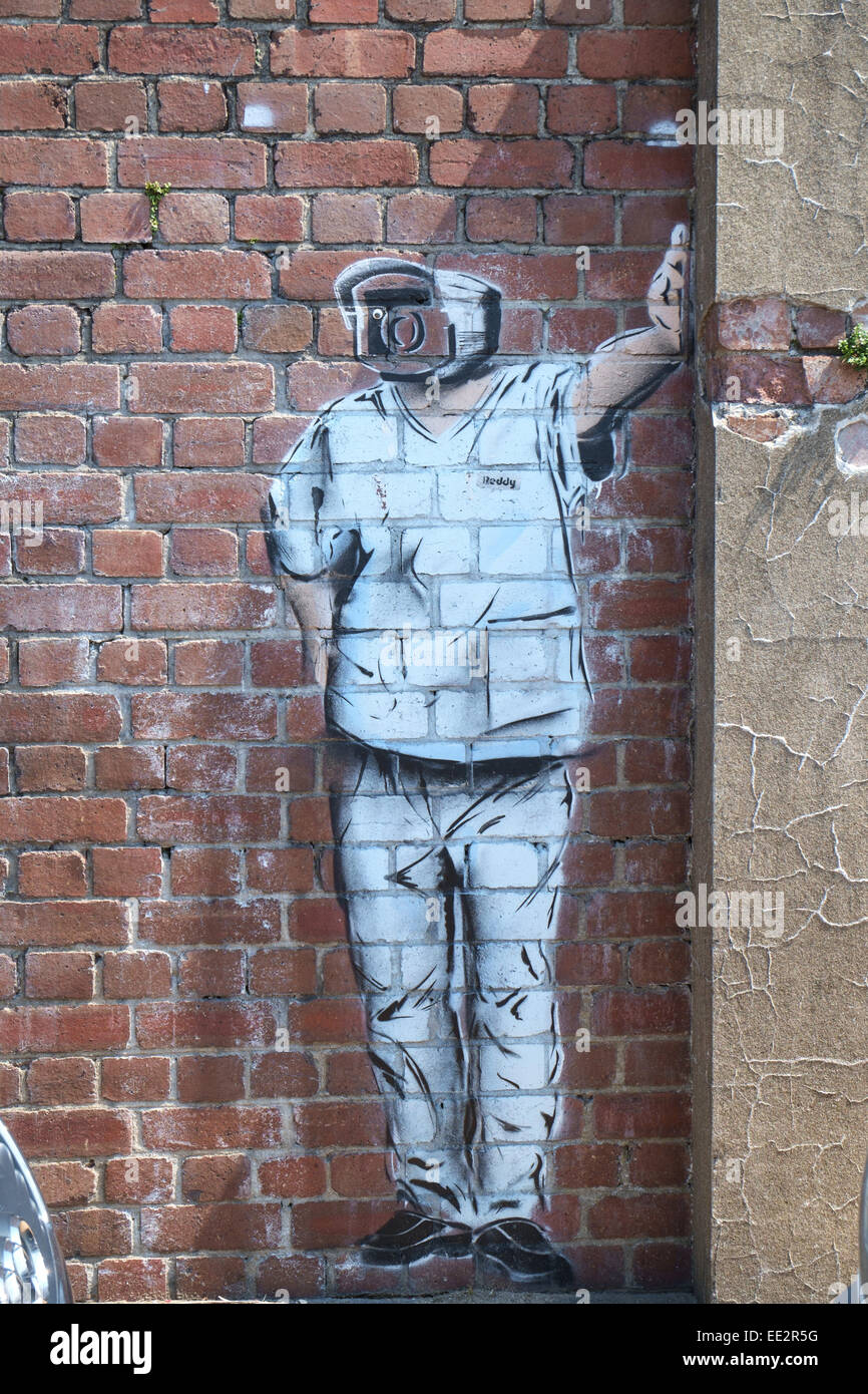 Graffiti Art, Figure with CCTV Camera Head Stock Photo - Alamy
