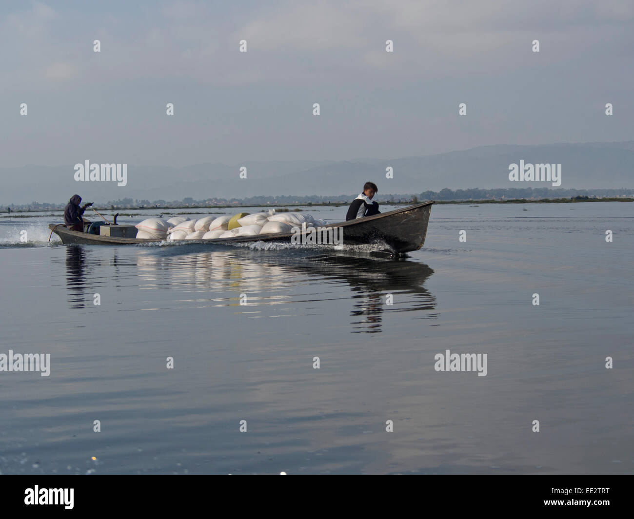 Farmers carry goods by boat to market in Inle lake, Shan state, Myanmar ...