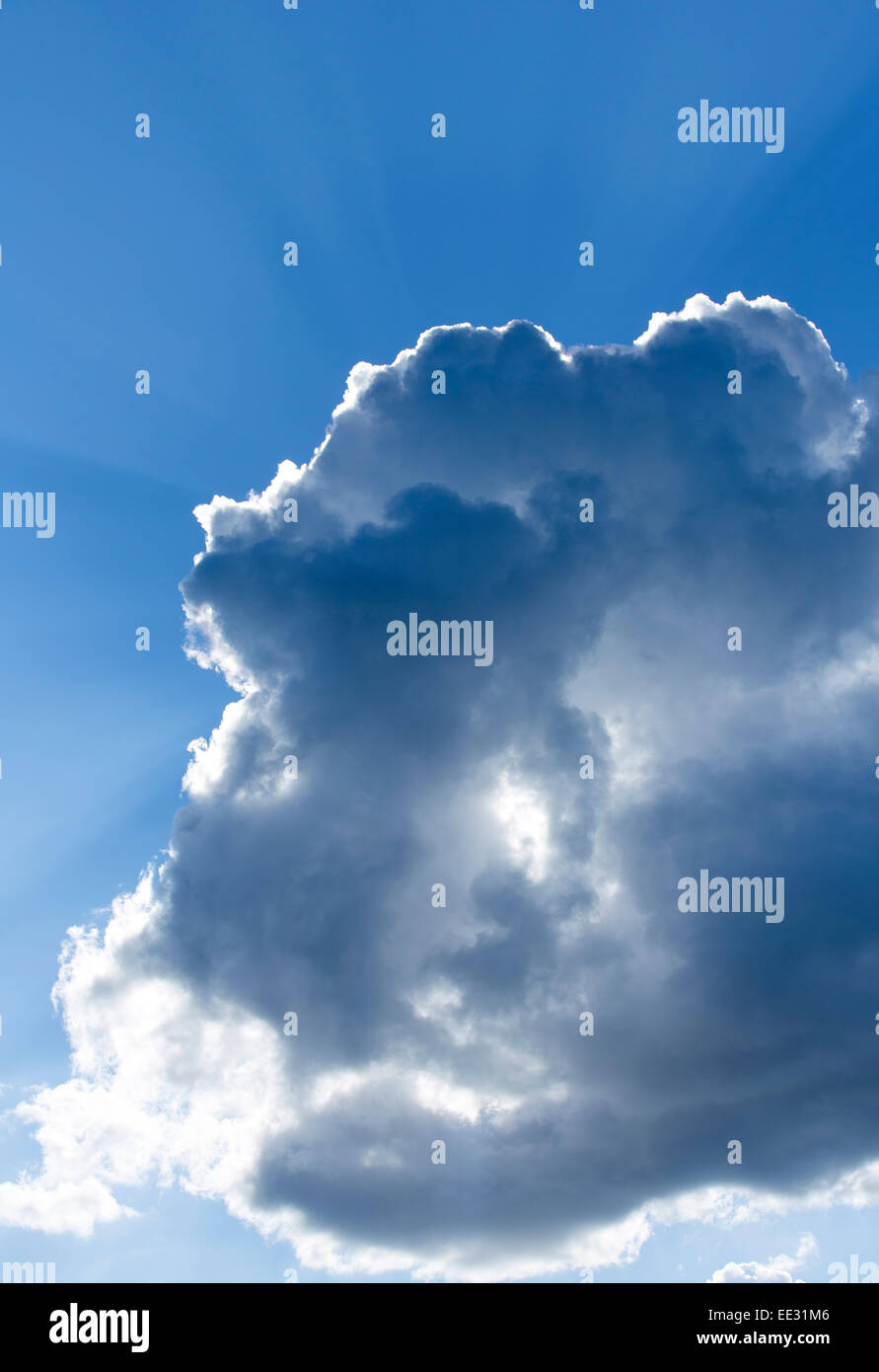 Sun rays behind dark cloud , Finland Stock Photo - Alamy