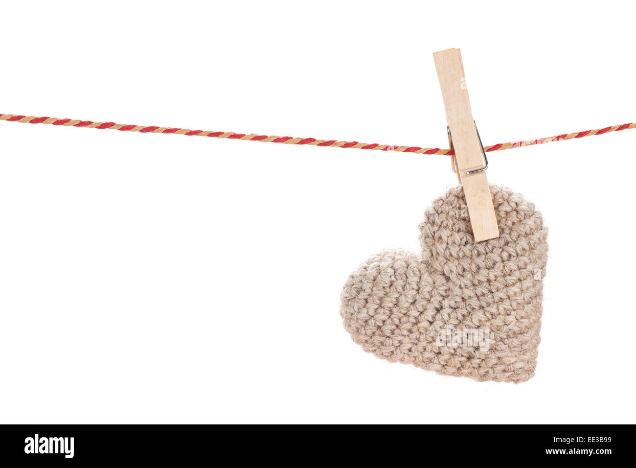 Valentines day toy heart hanging on rope. Isolated on white background ...