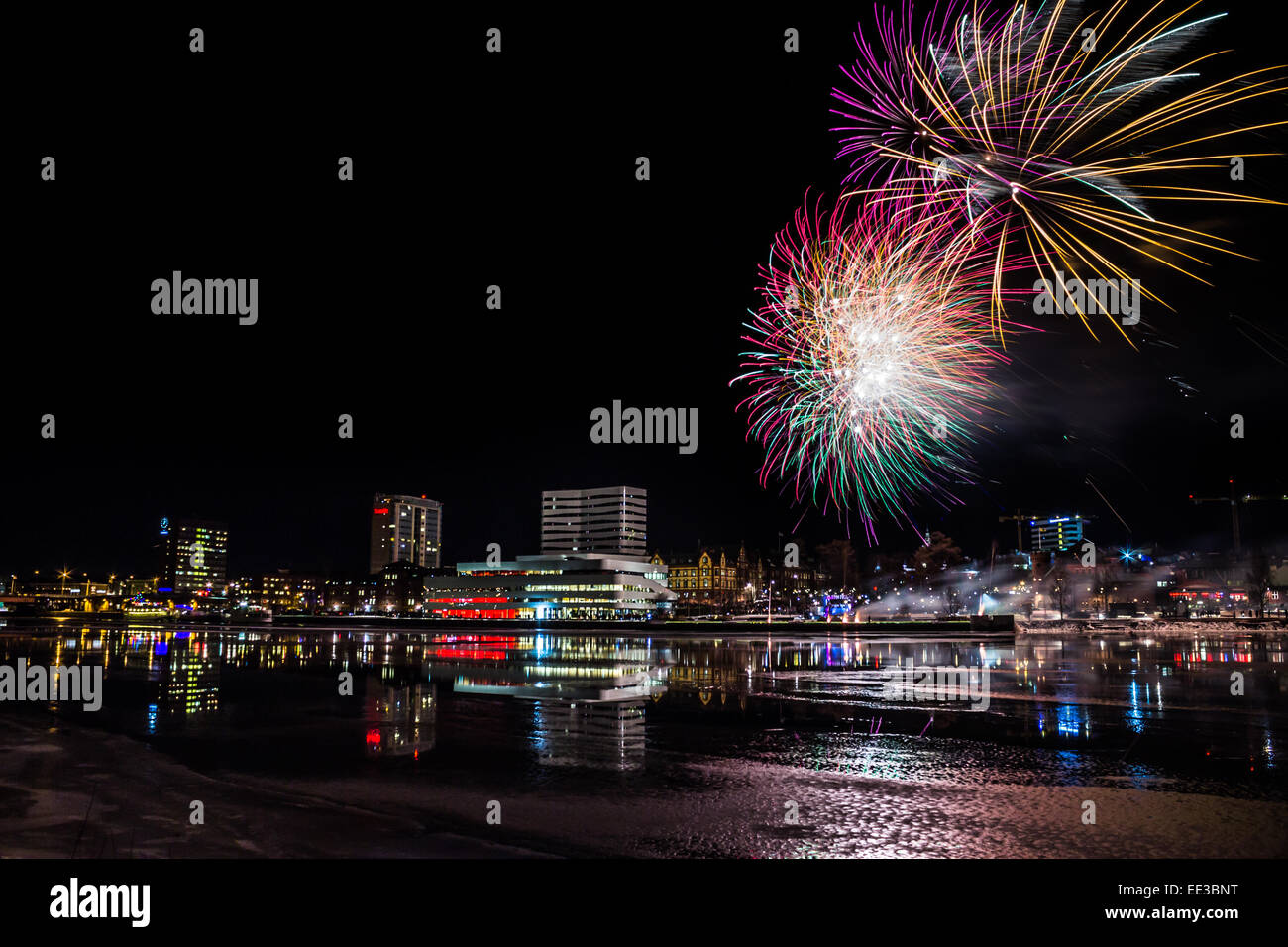 Fireworks over City Skyline Stock Photo - Alamy