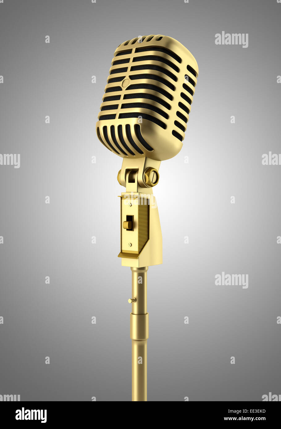 golden vintage microphone isolated on gray background Stock Photo - Alamy