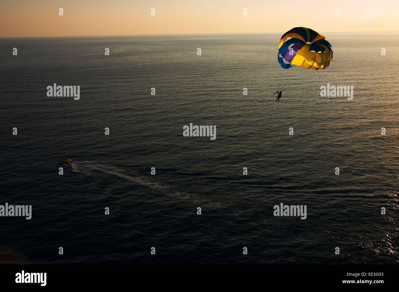 Parasailing by motorboat over sea hi-res stock photography and images ...