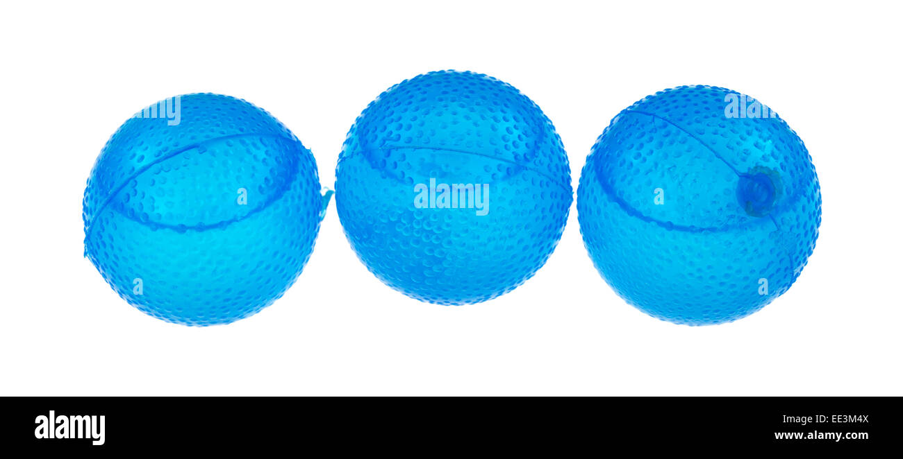 Three blue filled plastic ice cubes on a white background Stock Photo ...