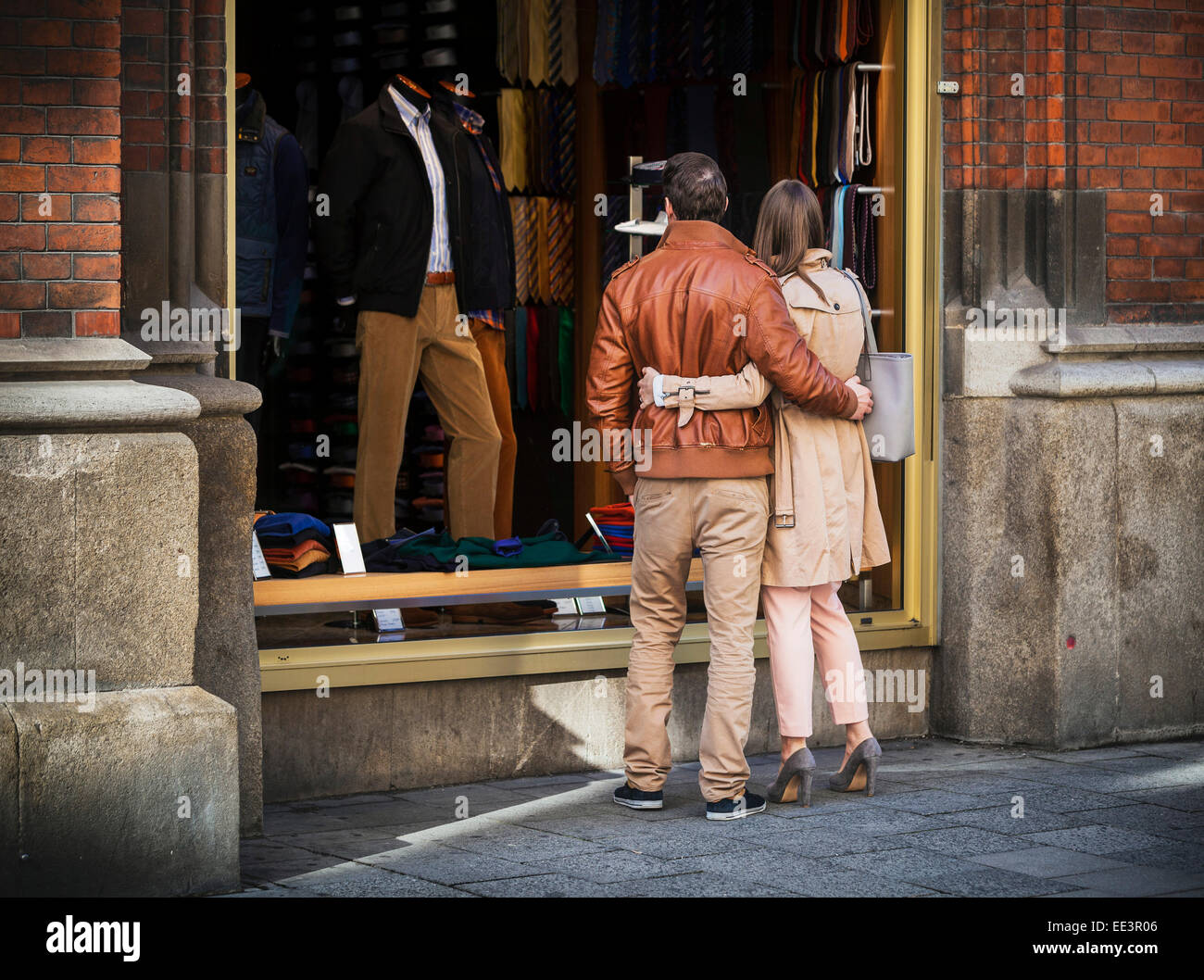 Young couple shopping, Marienplatz, Munich, Bavaria, Germany Stock ...
