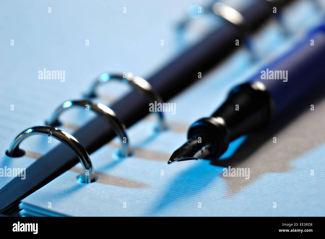Pen and notebook, isolated on white background Stock Photo - Alamy