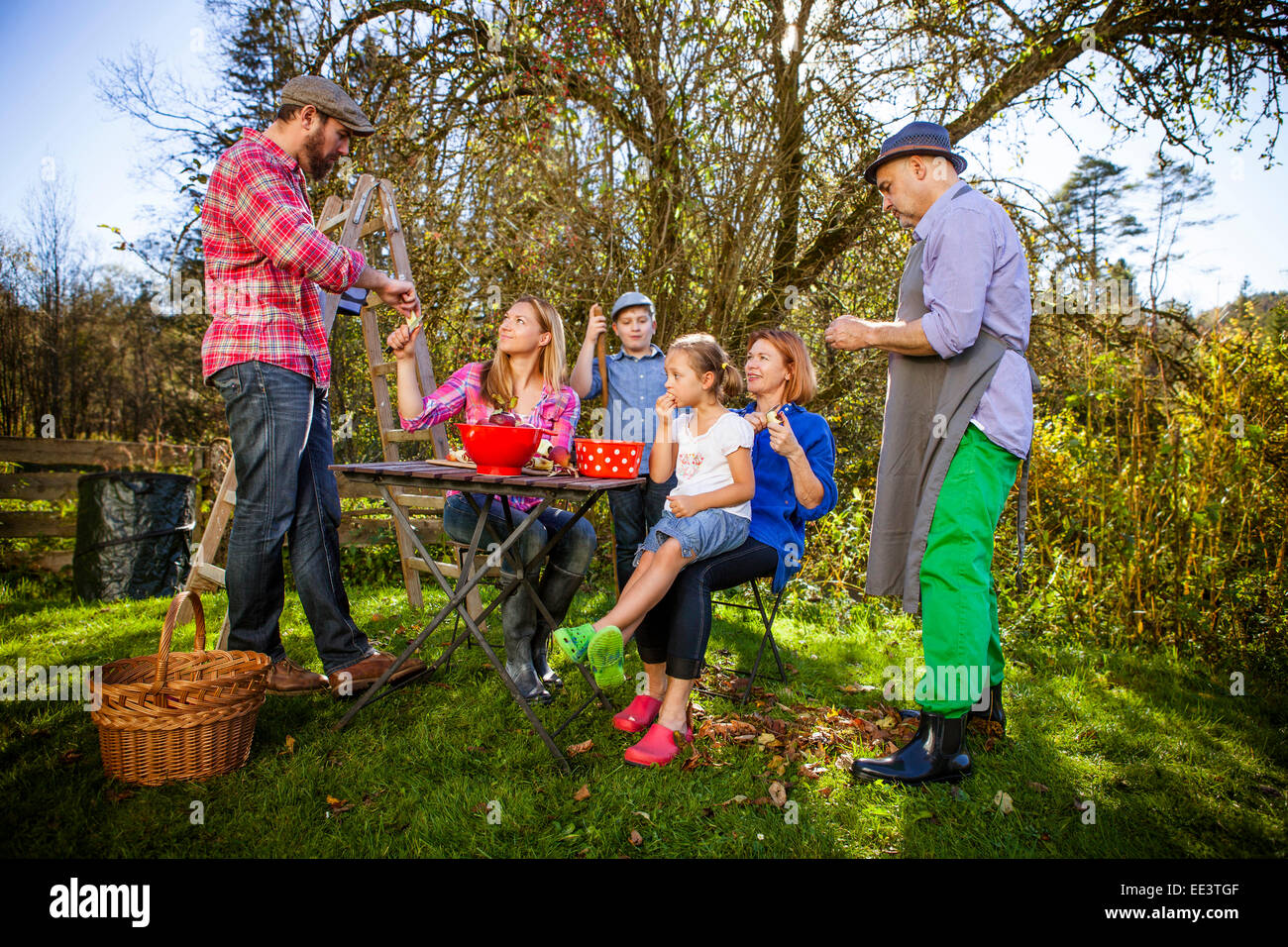Multi-generation family peeling apples, Munich, Bavaria, Germany Stock ...