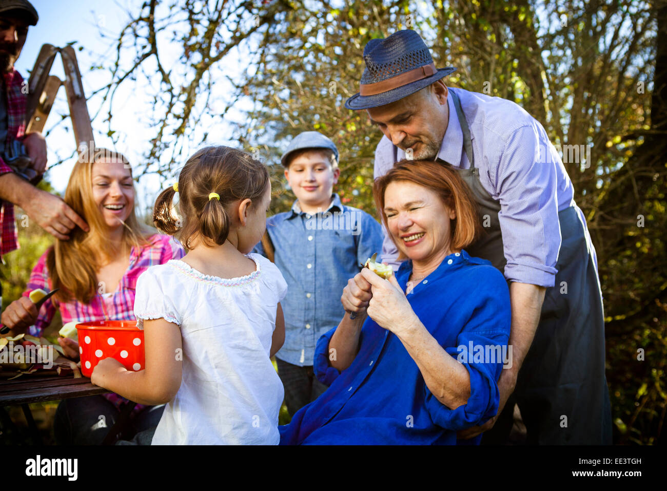 Multi-generation family peeling apples, Munich, Bavaria, Germany Stock ...
