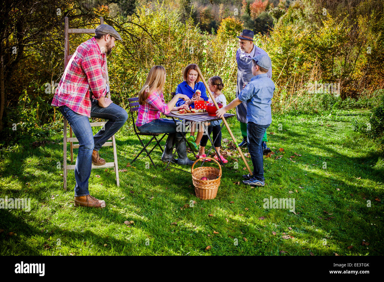 Multi-generation family peeling apples, Munich, Bavaria, Germany Stock ...