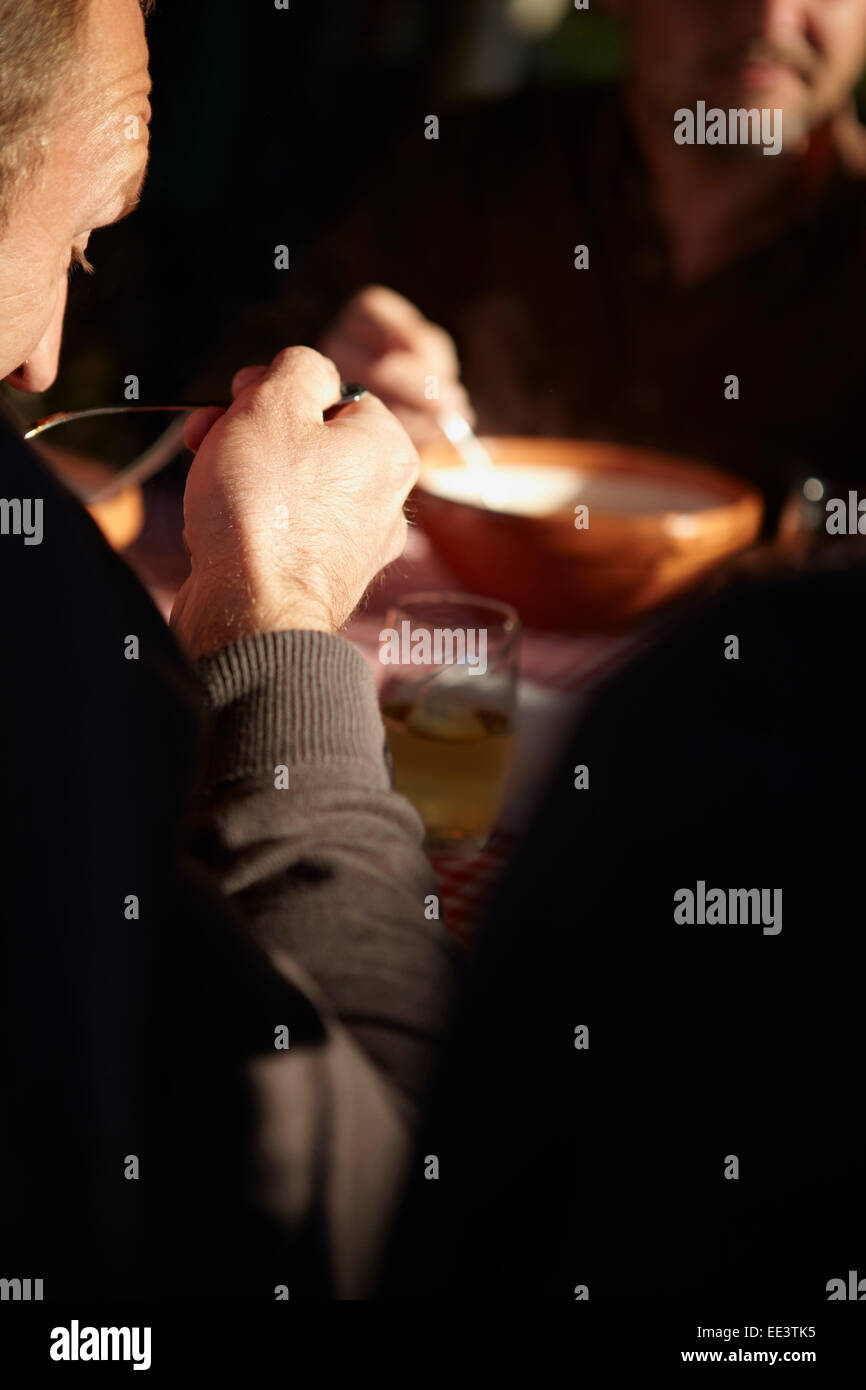 Friends eating soup together Stock Photo - Alamy