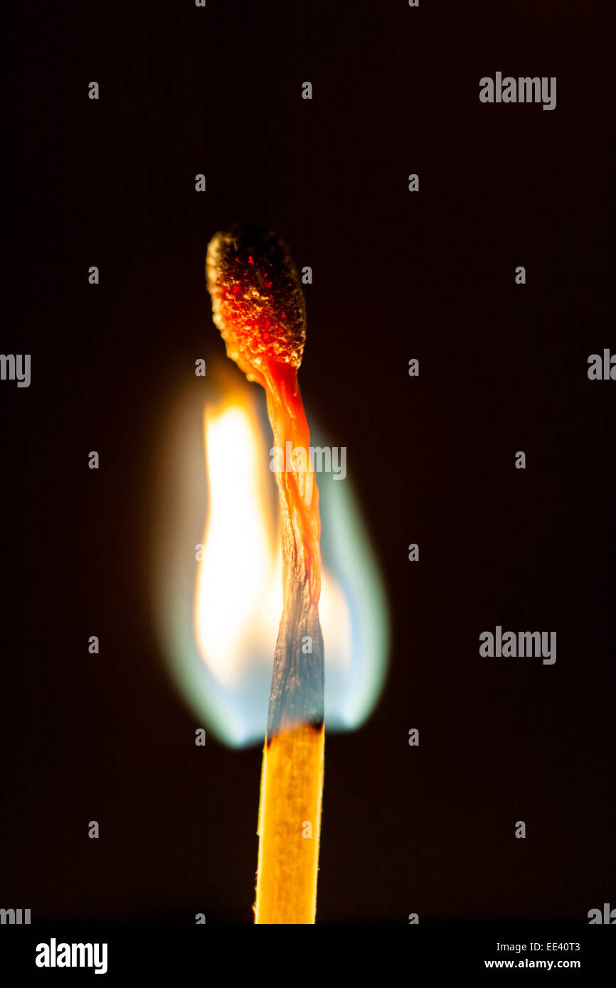 Match just ignited, flame at the match head Stock Photo - Alamy