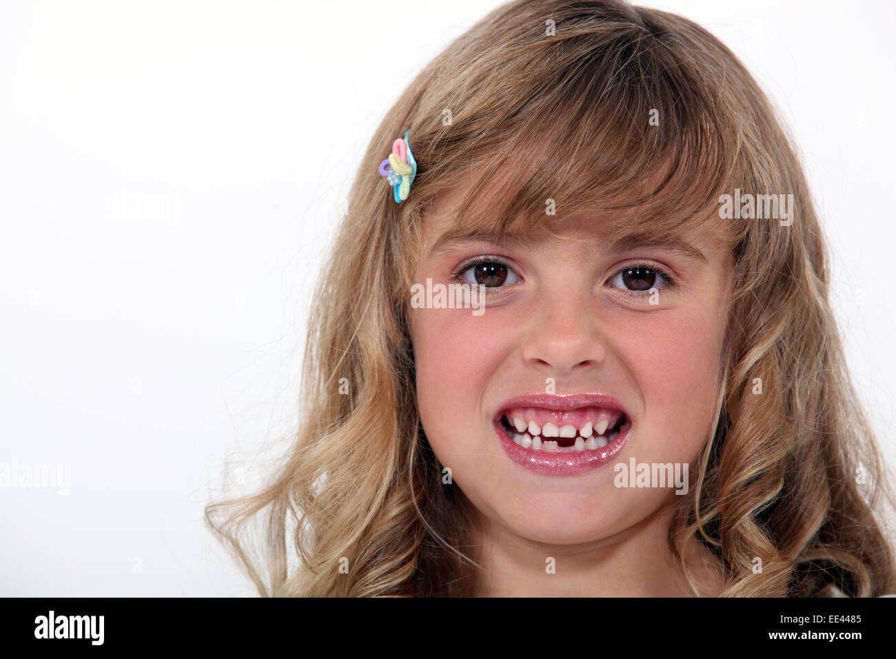 Birl baring her teeth Stock Photo - Alamy