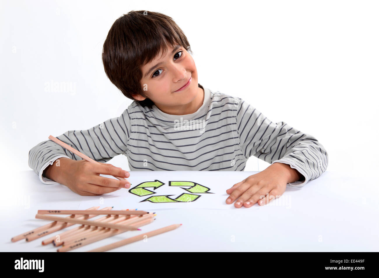 Little boy drawing logo on paper Stock Photo - Alamy