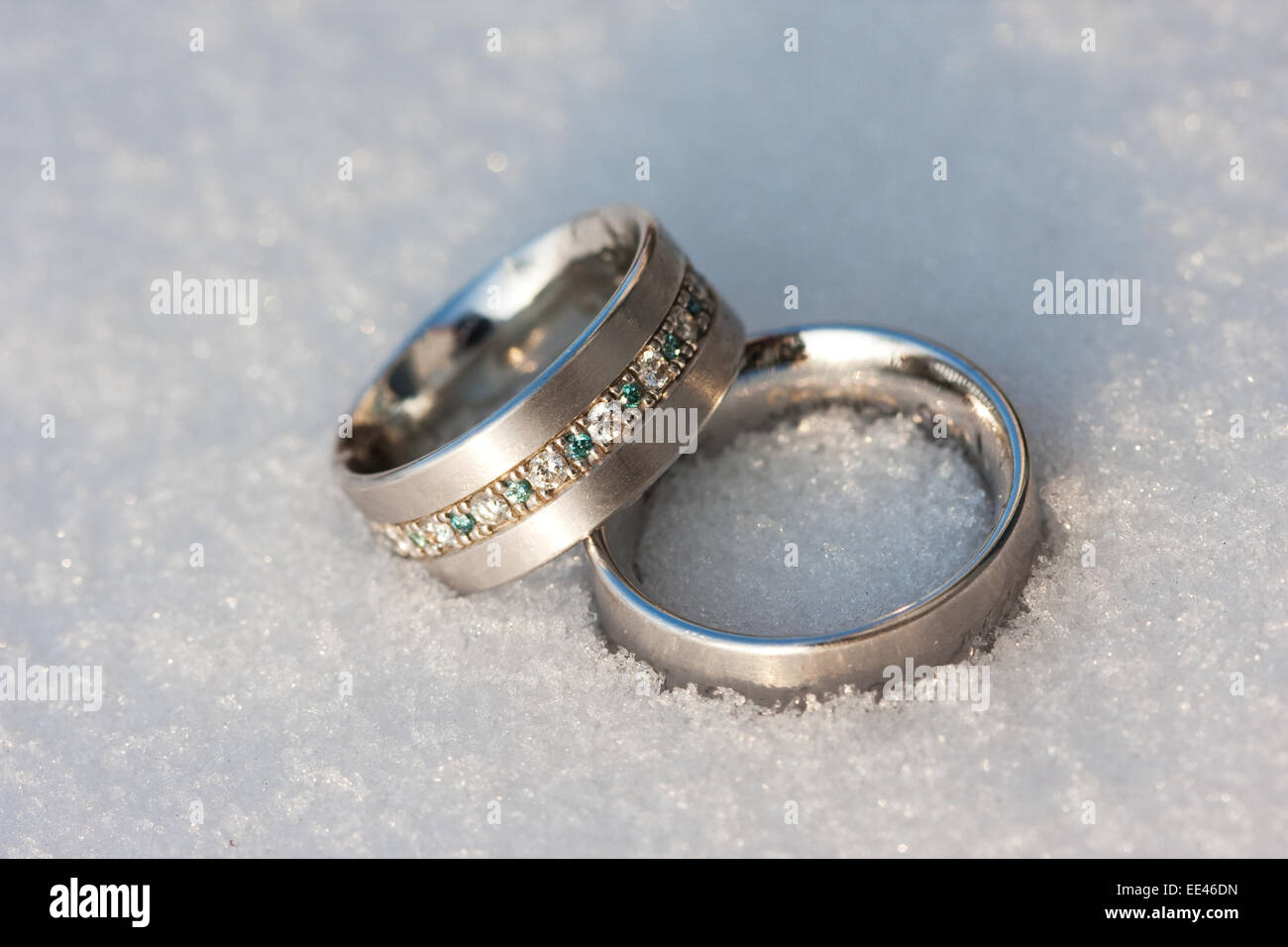 Wedding Rings in the snow Stock Photo - Alamy