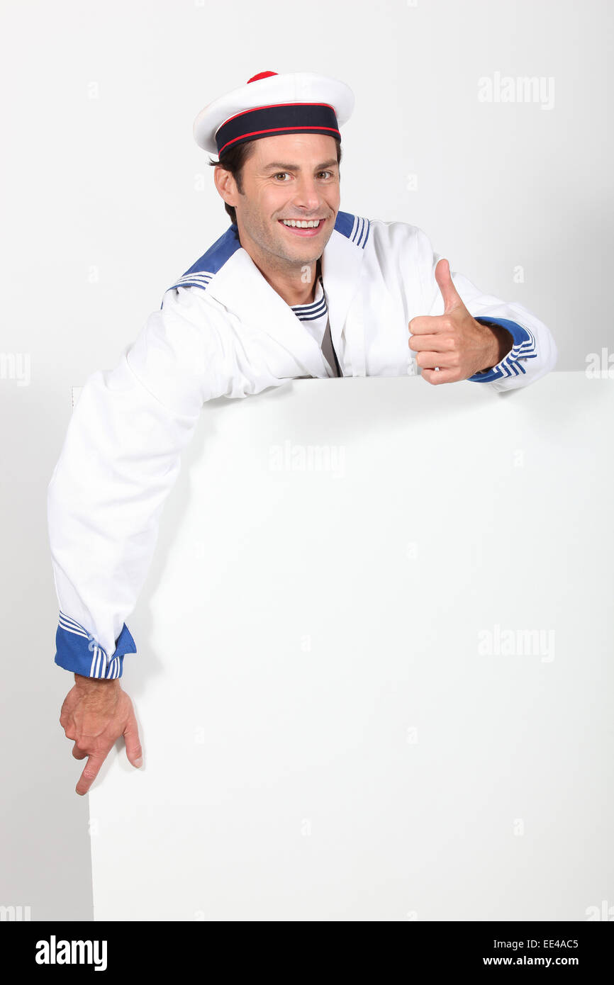 Sailor man uniform behind hi-res stock photography and images - Alamy