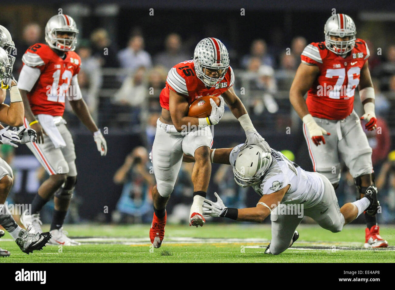 Ohio State quarterback Cardale Jones (12) and offensive lineman Darryl ...