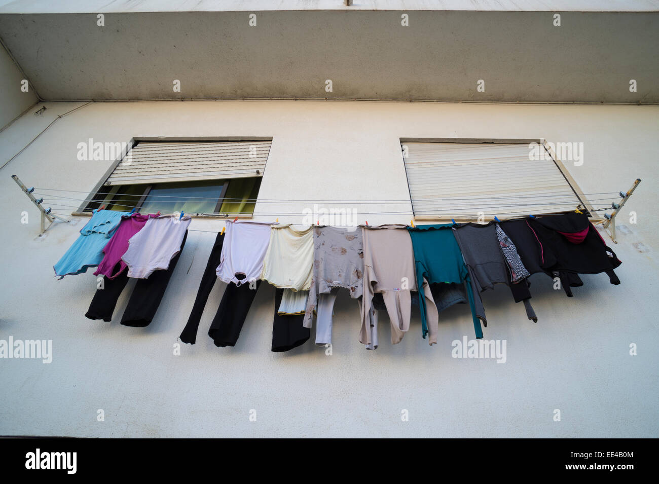 washing on line between windows in Albufeira Algarve Portugal Stock ...