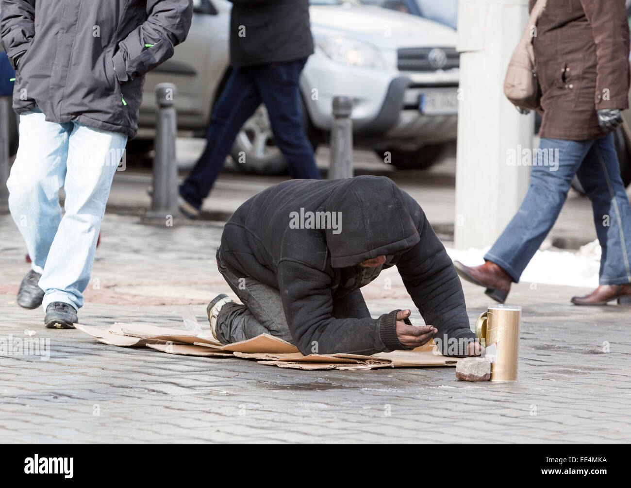 A homeless begger is begging on a busy street in the center of Sofia ...