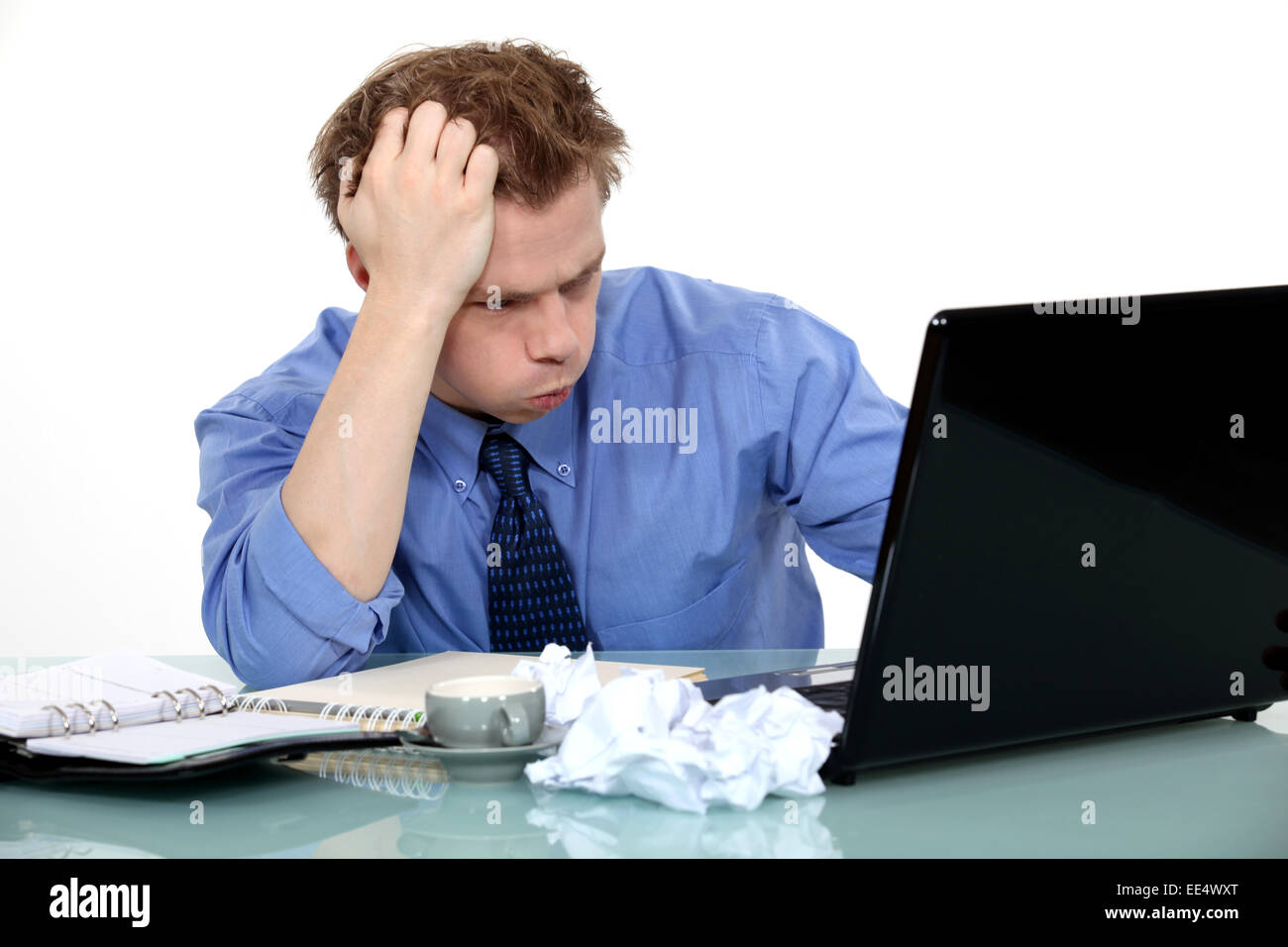 Stressed businessman making no progress Stock Photo - Alamy